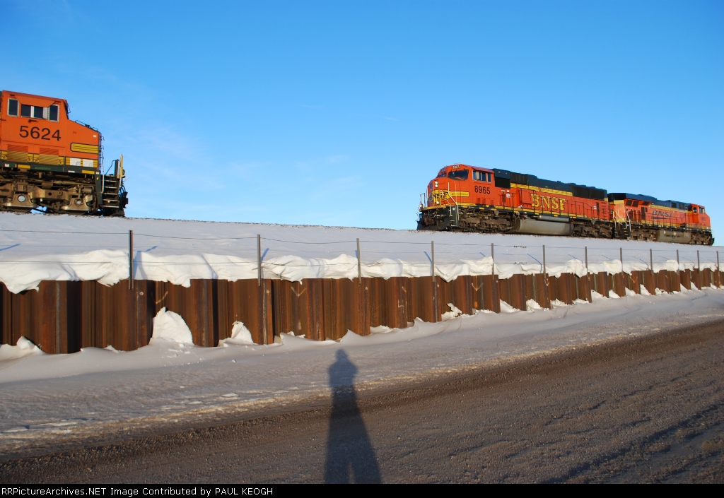 BNSF 8965 and BNSF 5863 Helper train units get closer to BNSF 5624 for the hook. I am in the ...